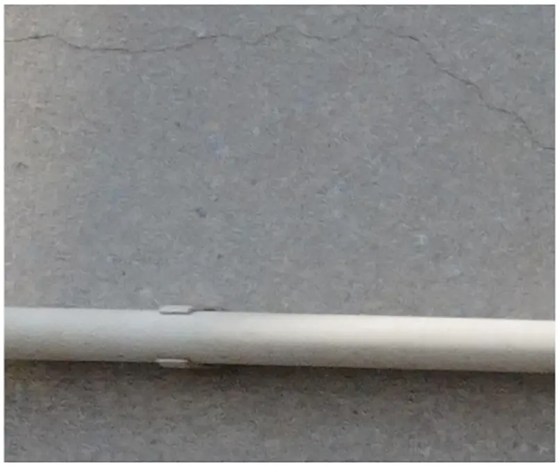 Wall Cracks Detection in Aerial Images Using Improved Mask R-CNN